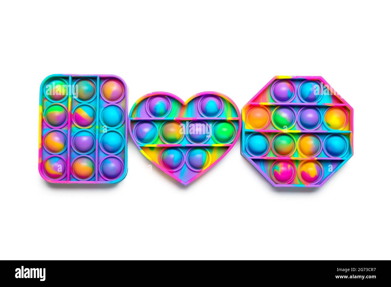 Bright fidget toys on white background Stock Photo - Alamy