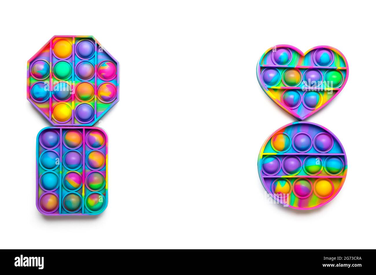 Bright fidget toys on white background Stock Photo - Alamy