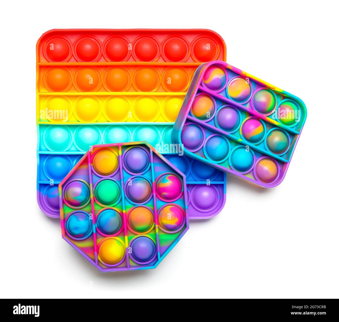 Bright fidget toys on white background Stock Photo - Alamy