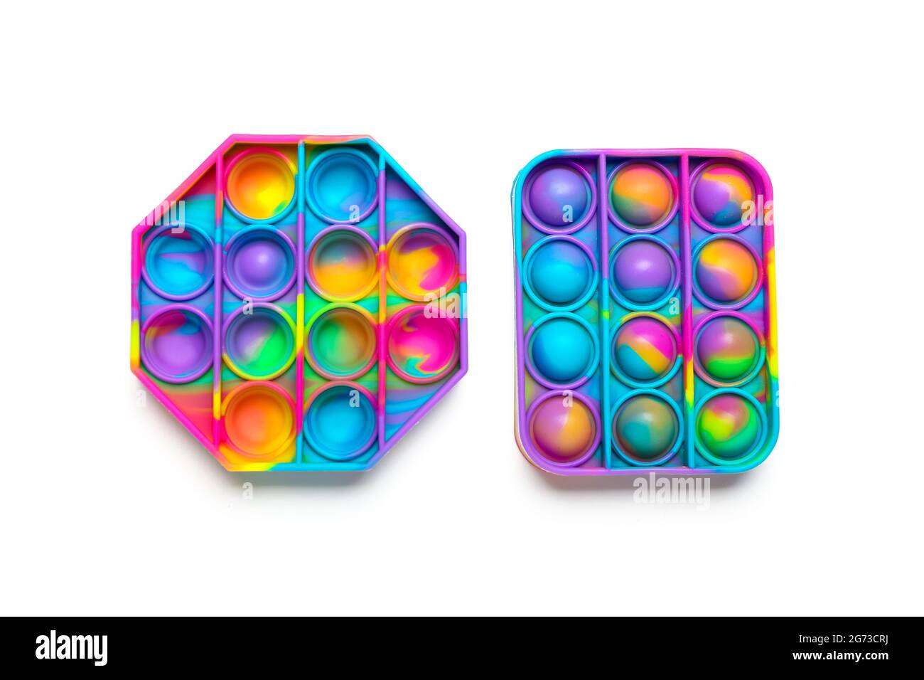 Bright fidget toys on white background Stock Photo - Alamy