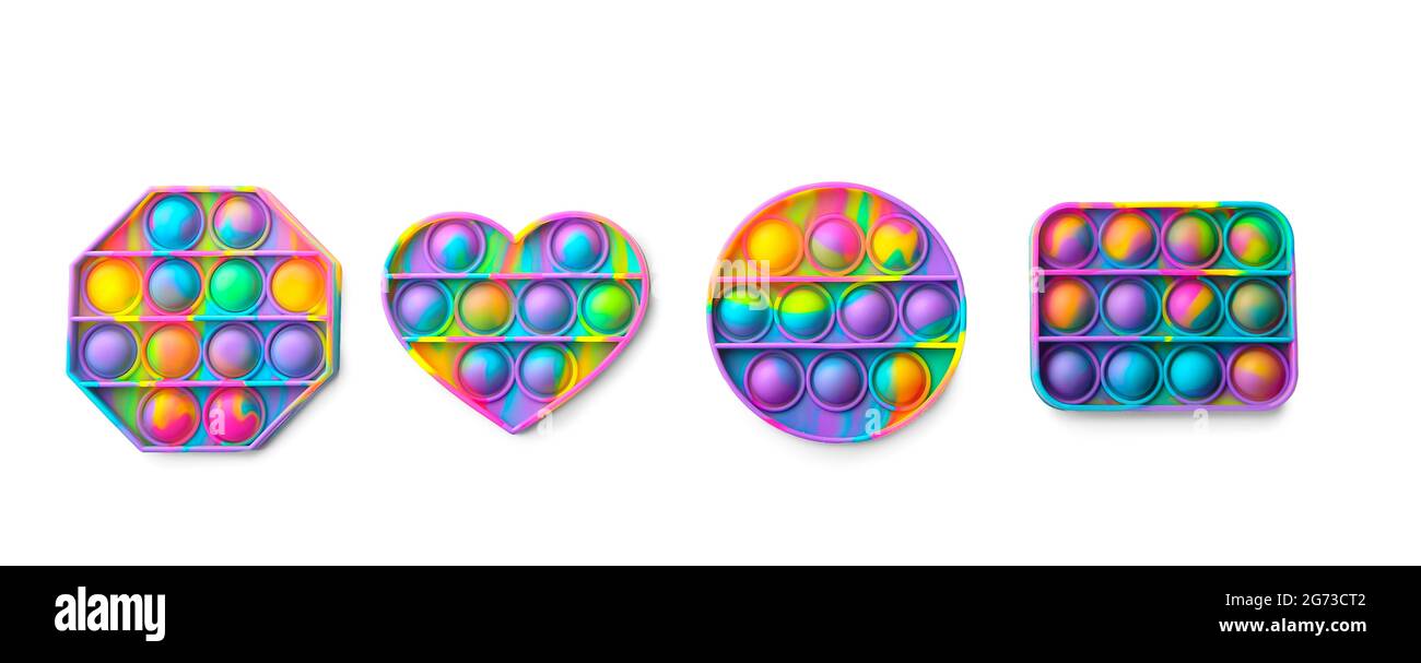 Bright fidget toys on white background Stock Photo - Alamy