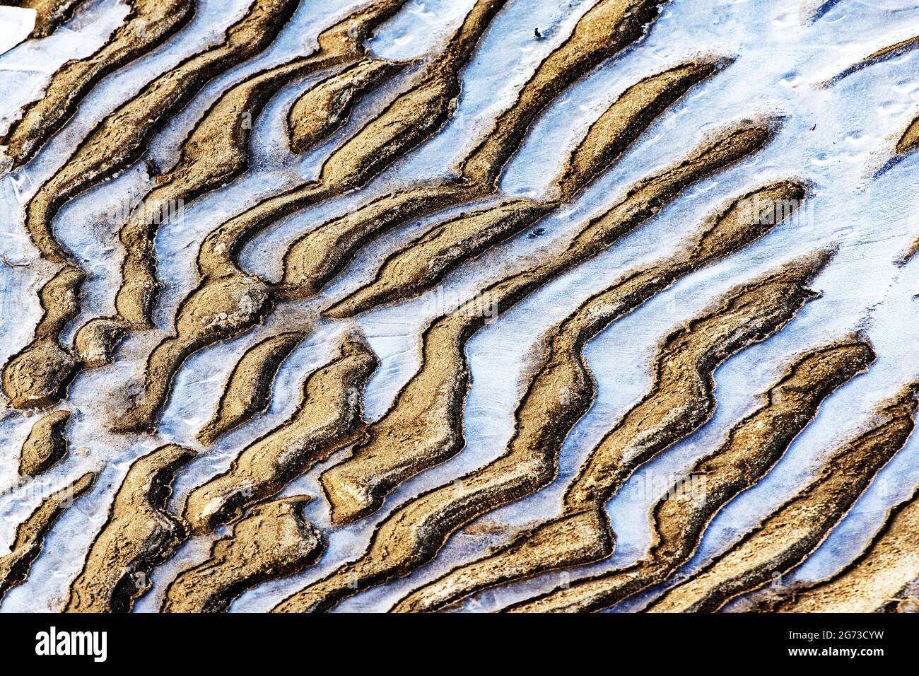 Image of snow and land forming stripes. Snow and land marks resembling ...