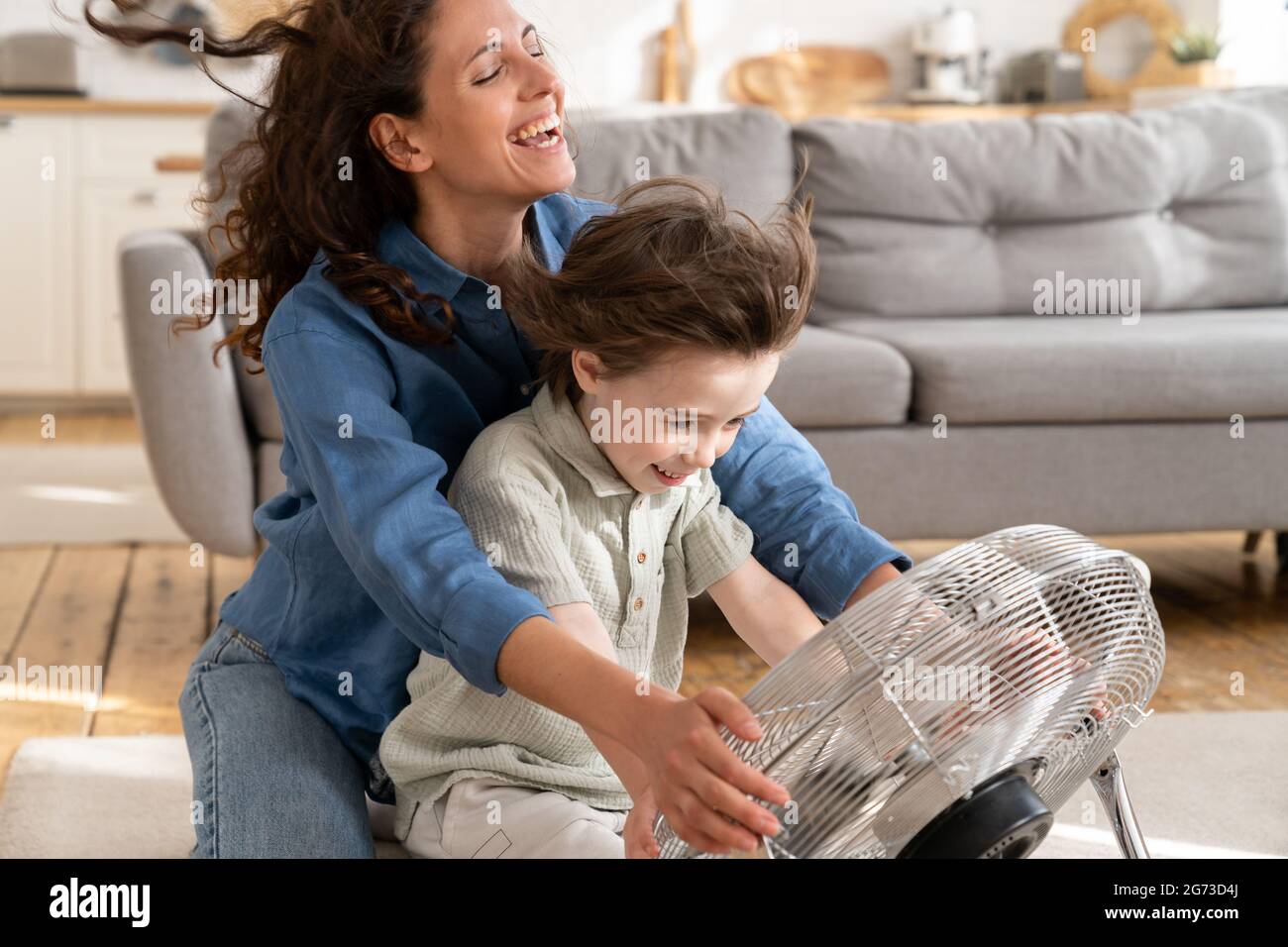 Cooling fan child hi-res stock photography and images - Alamy