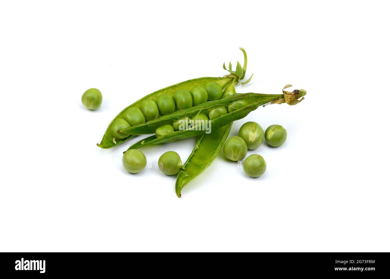 Fresh green peas isolated on white background Stock Photo - Alamy
