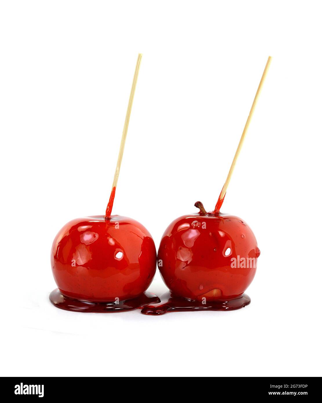 Two Toffee apple on white background Stock Photo - Alamy