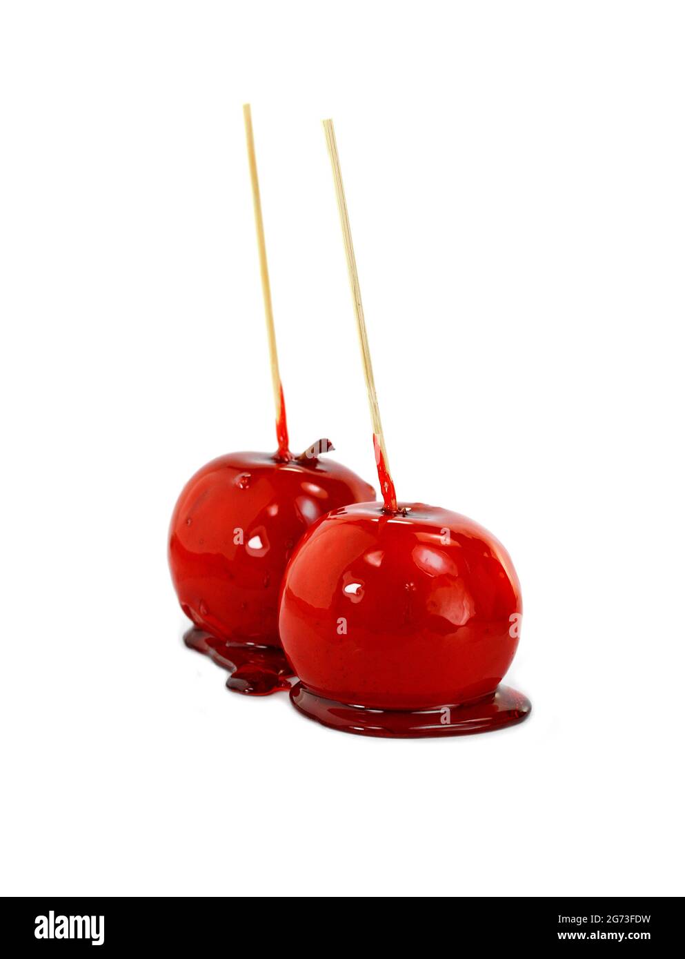 Two Toffee apple on white background Stock Photo - Alamy