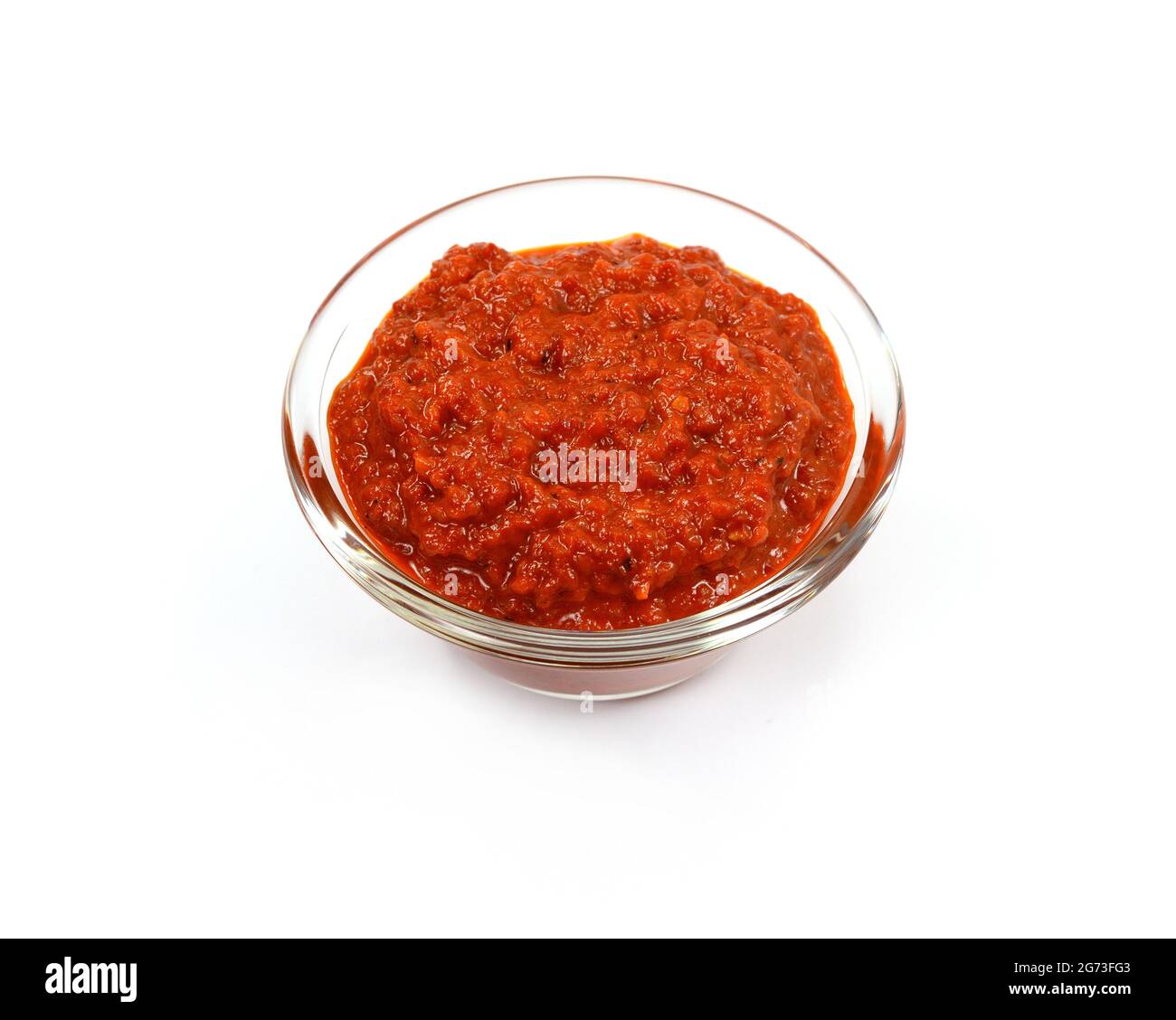 Ajvar in a bowl isolated on white- traditional macedonian serbian dish ...