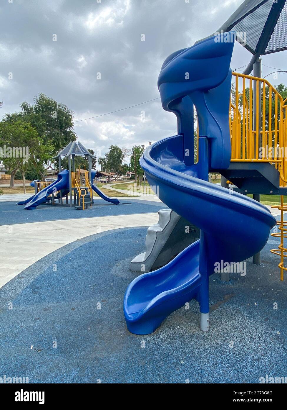 Slide, swing on modern playground. Children playground activities in ...