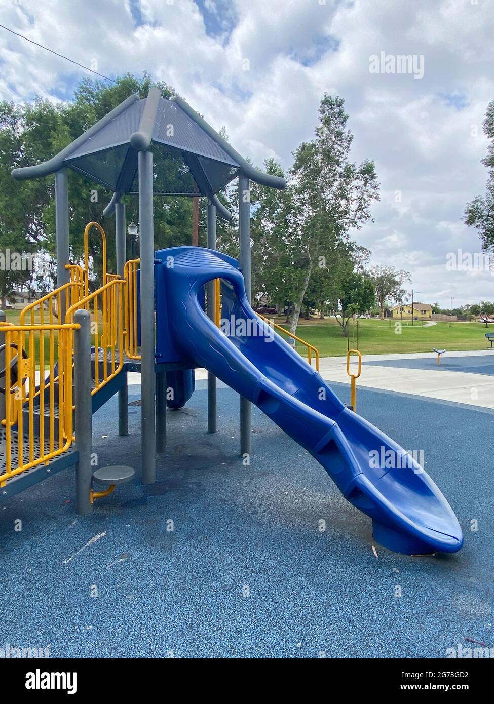Slide, swing on modern playground. Children playground activities in ...