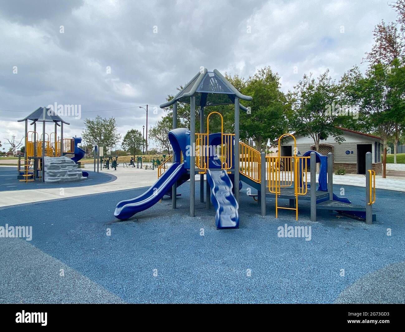 Slide, swing on modern playground. Children playground activities in ...
