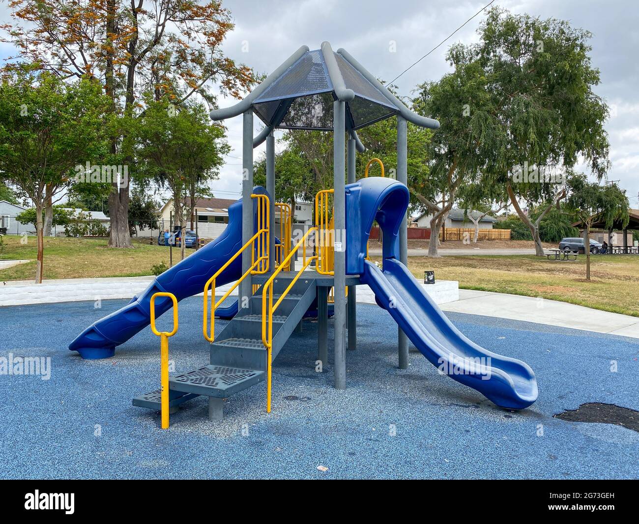 Slide, swing on modern playground. Children playground activities in ...