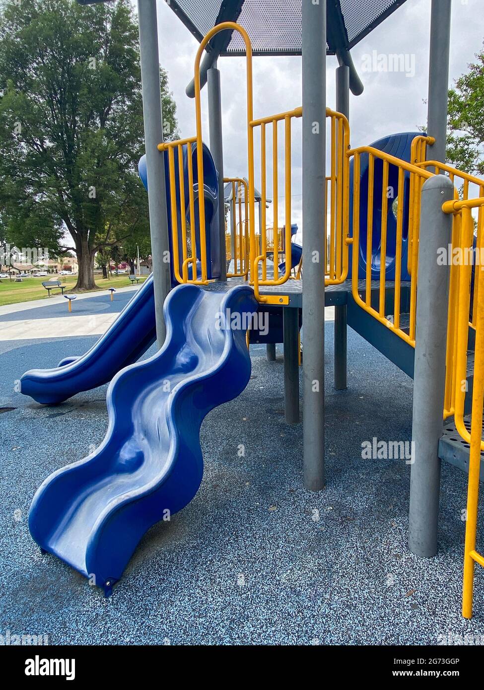 Slide, swing on modern playground. Children playground activities in ...