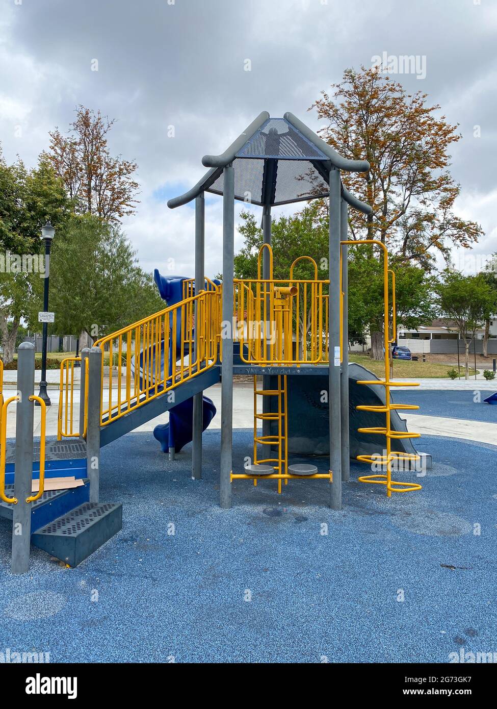 Slide, swing on modern playground. Children playground activities in ...