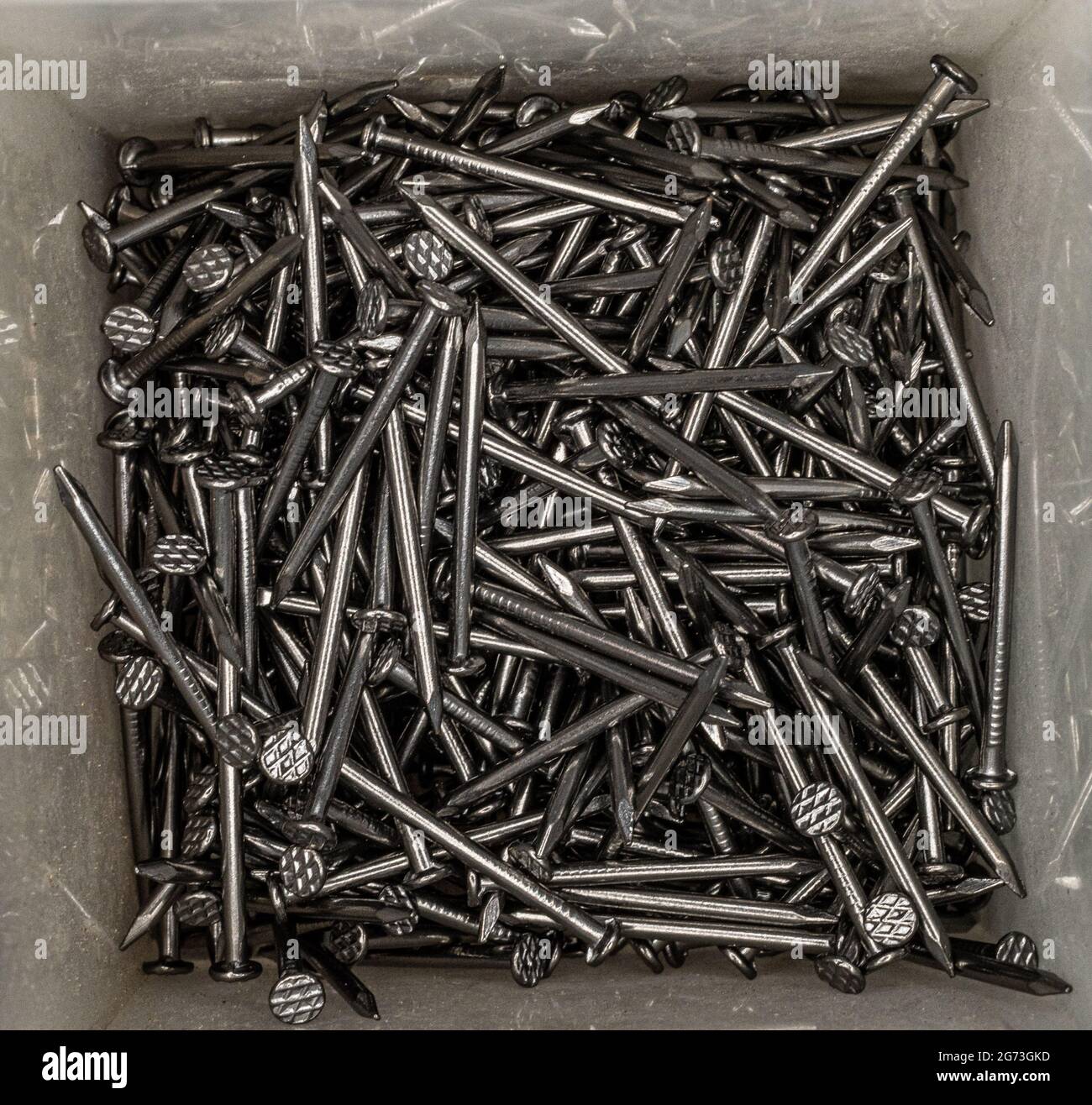 Shot of screws in a box Stock Photo - Alamy