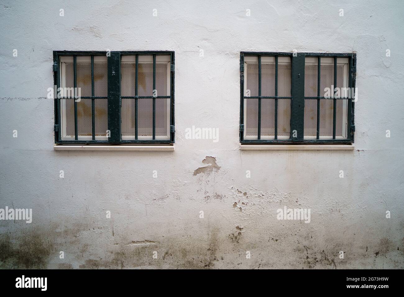 Windows with lattice on a white wall of a building Stock Photo - Alamy