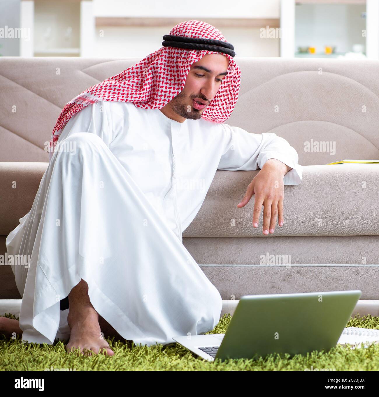 The arab man working at home on his work Stock Photo - Alamy