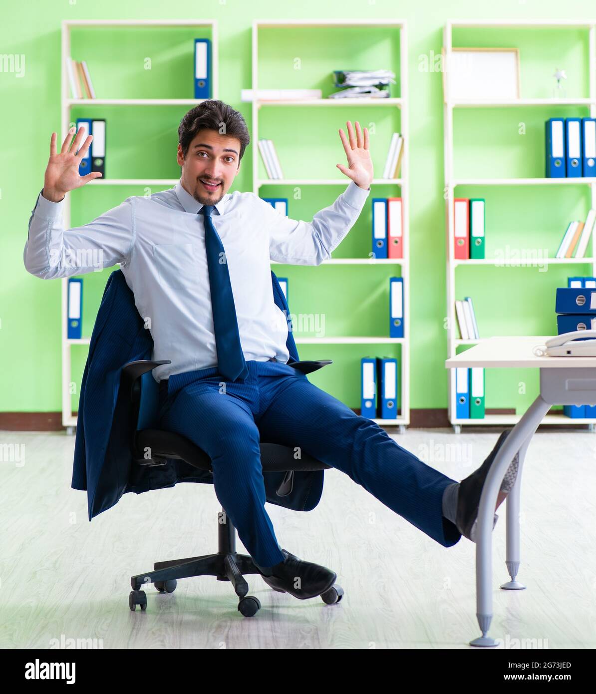 The employee doing exercises during break at work Stock Photo - Alamy
