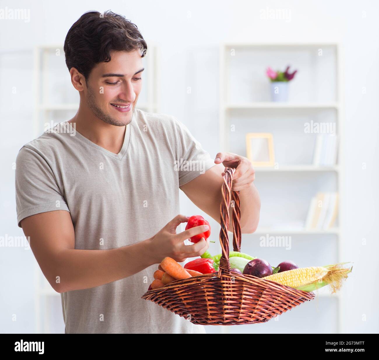 The young man in healthy eating and dieting concept Stock Photo - Alamy