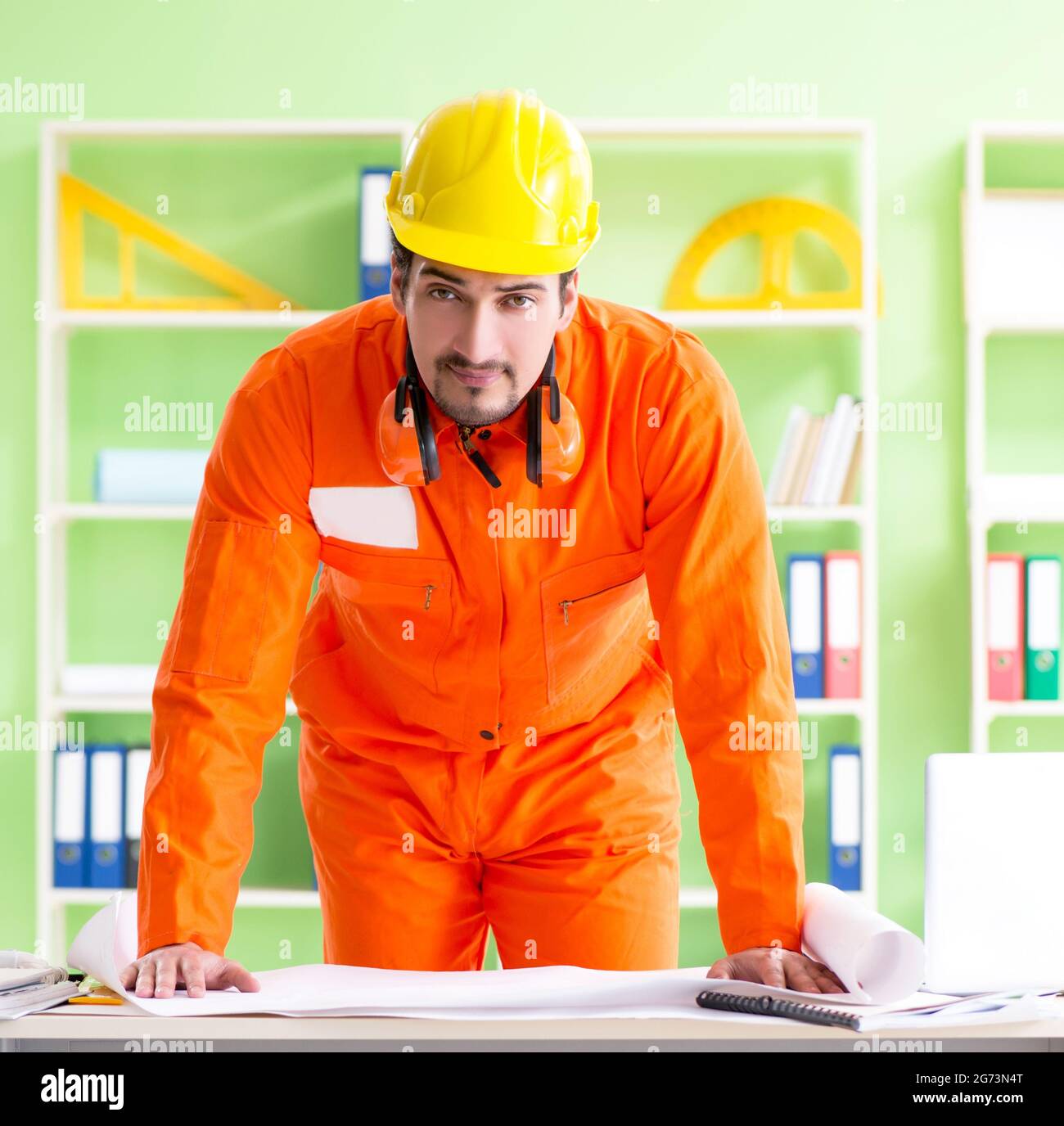 The construction supervisor planning new project in office Stock Photo ...