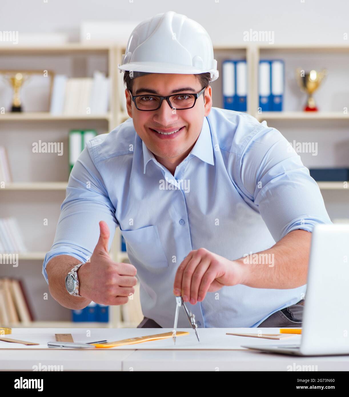 The male engineer working on drawings and blueprints Stock Photo - Alamy