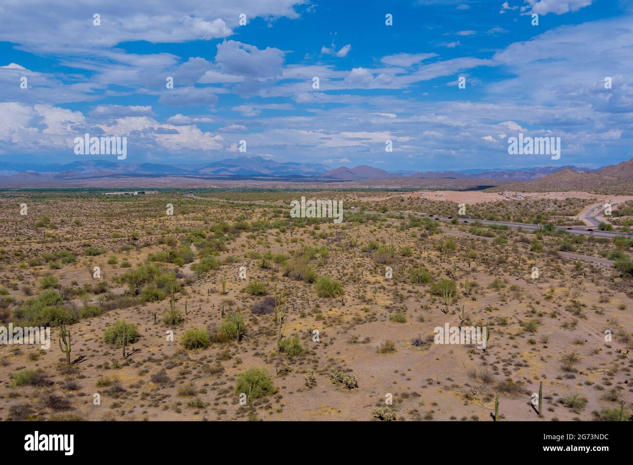 Aerial view of remote desert highway landscape in northern mountains ...