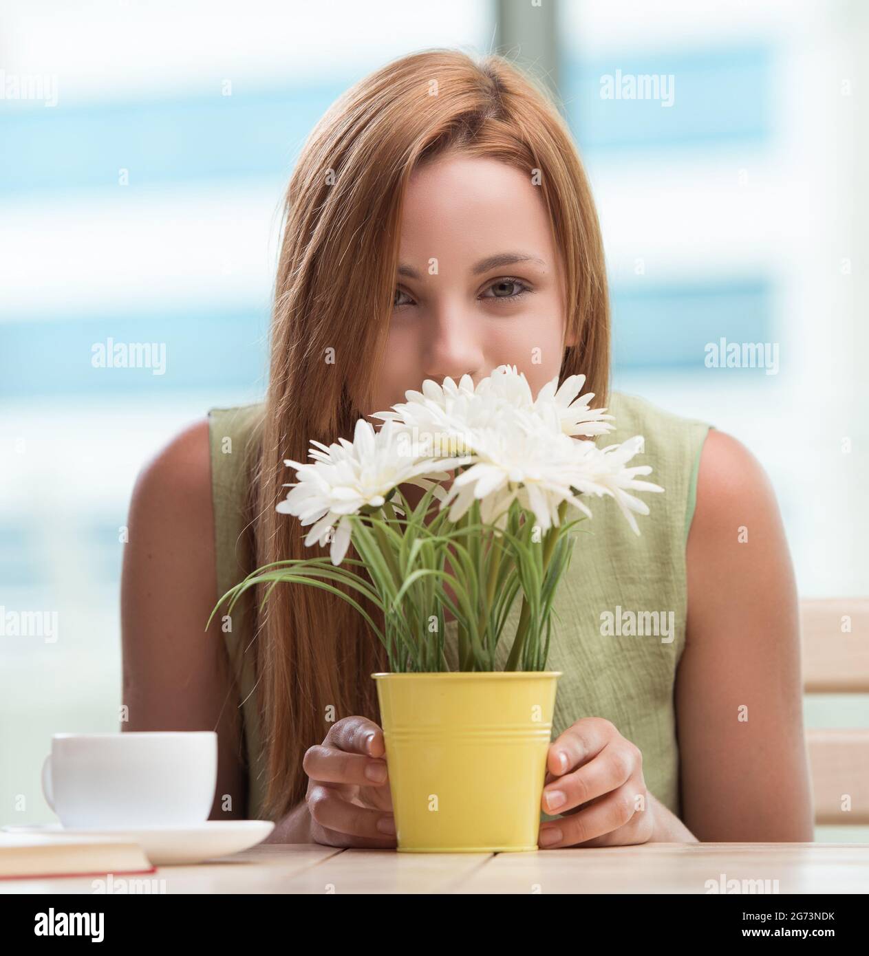 The young student preparing for exams drinking tea Stock Photo - Alamy