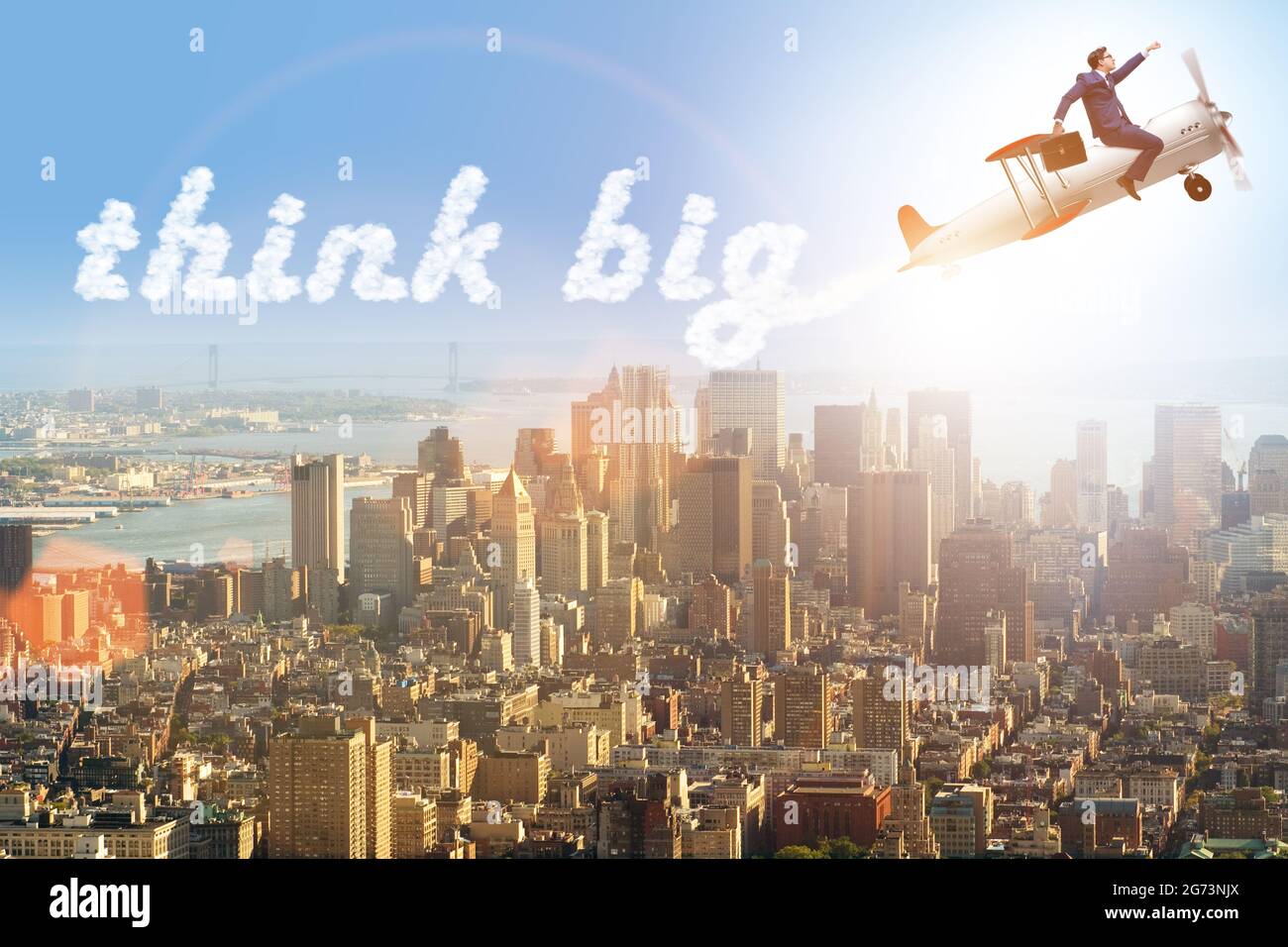 Think big concept with the businessman Stock Photo - Alamy