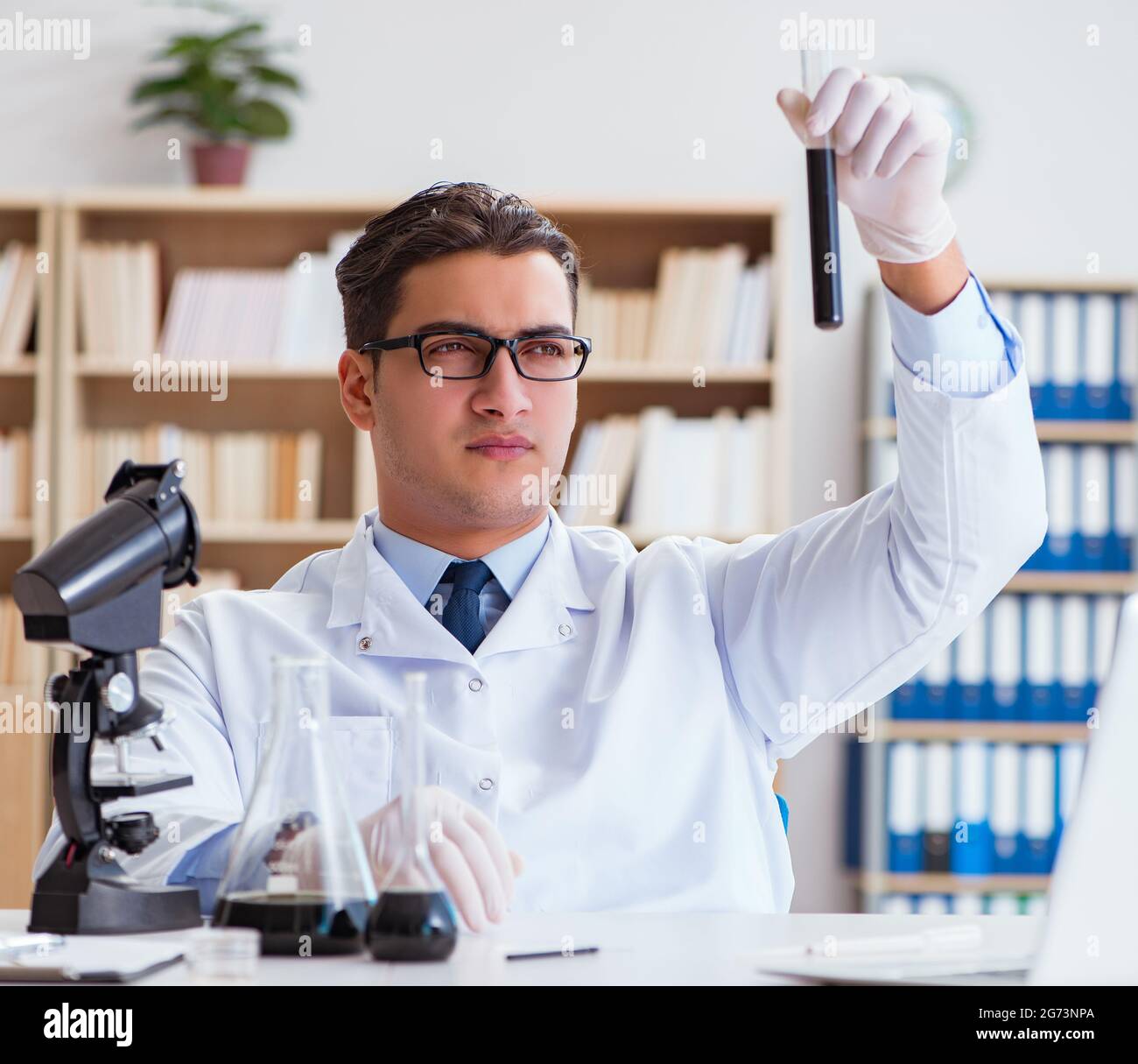 The chemical engineer working on oil samples in lab Stock Photo - Alamy