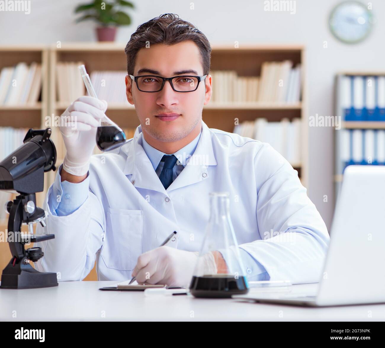 The chemical engineer working on oil samples in lab Stock Photo - Alamy
