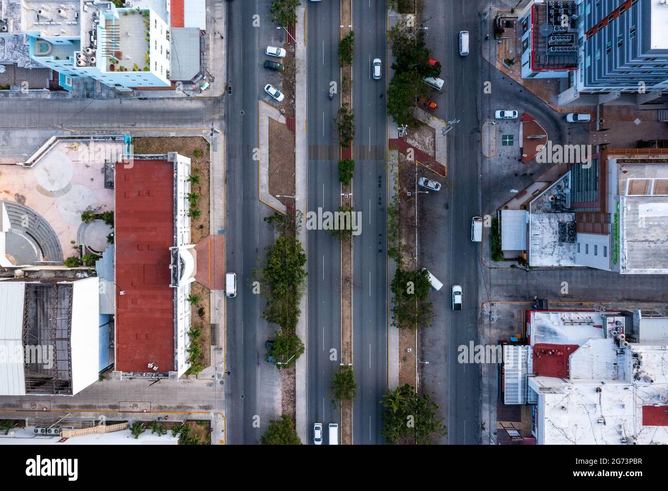 Busy street with small buildings near the beach area of Cancun Stock ...