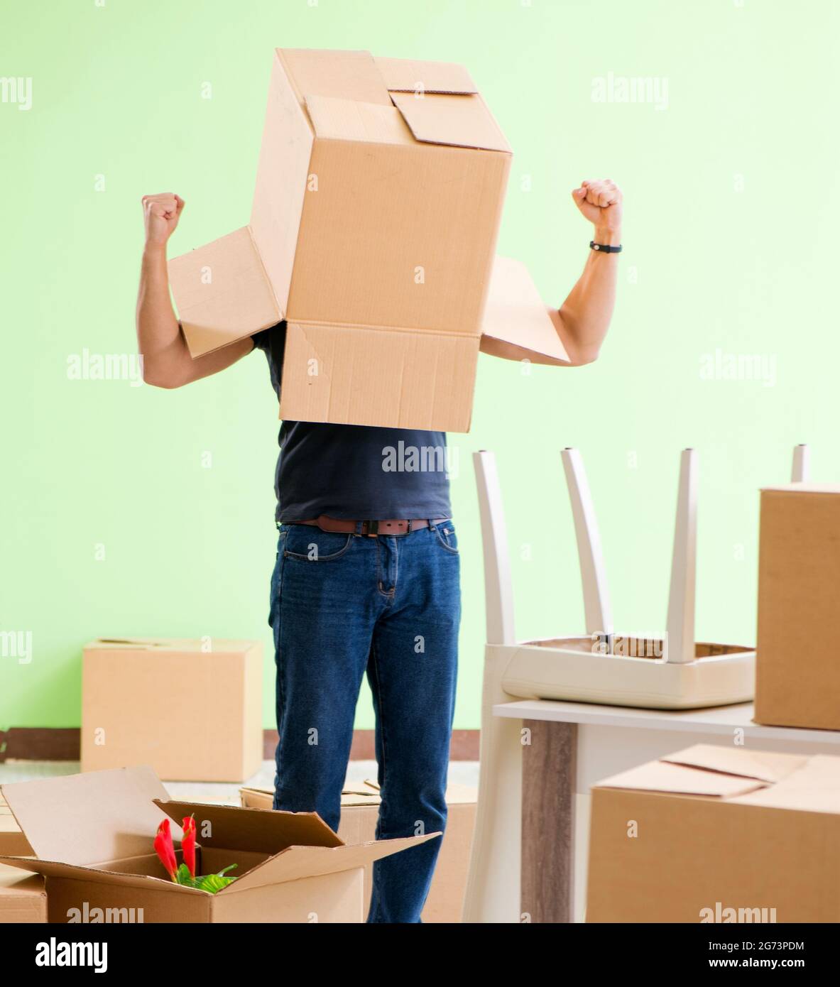 The man moving house with boxes Stock Photo - Alamy