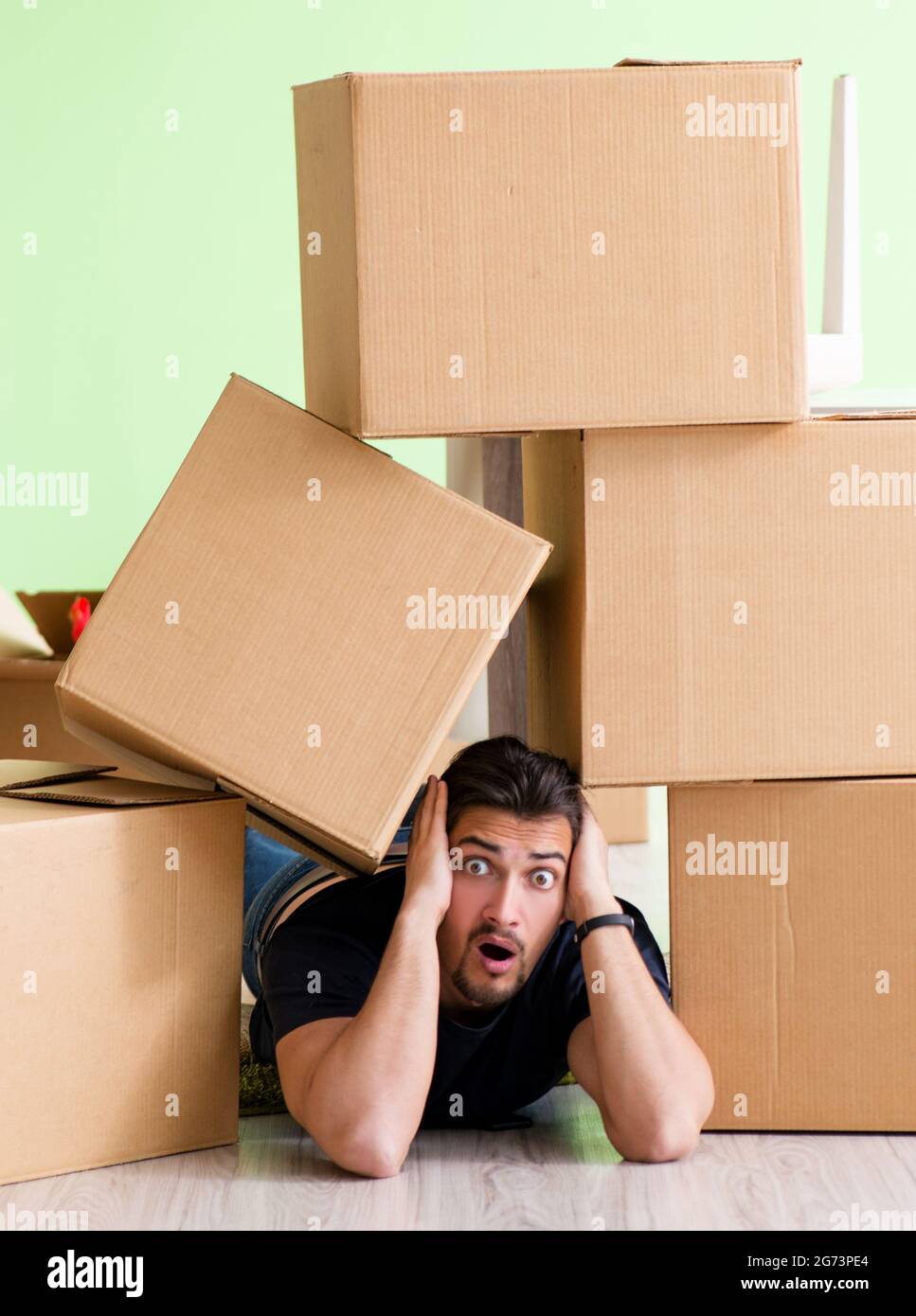 The man moving house with boxes Stock Photo - Alamy