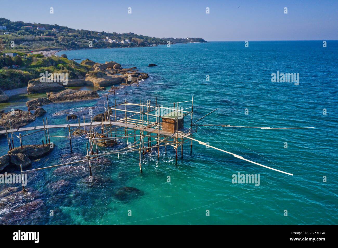 Construction of a building on a platform extended to the blue sea Stock ...