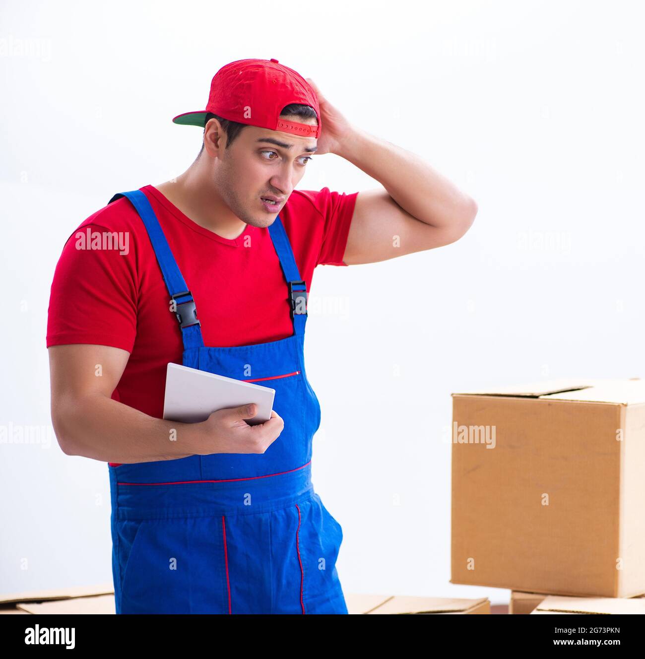 The contractor worker moving boxes during office move Stock Photo - Alamy