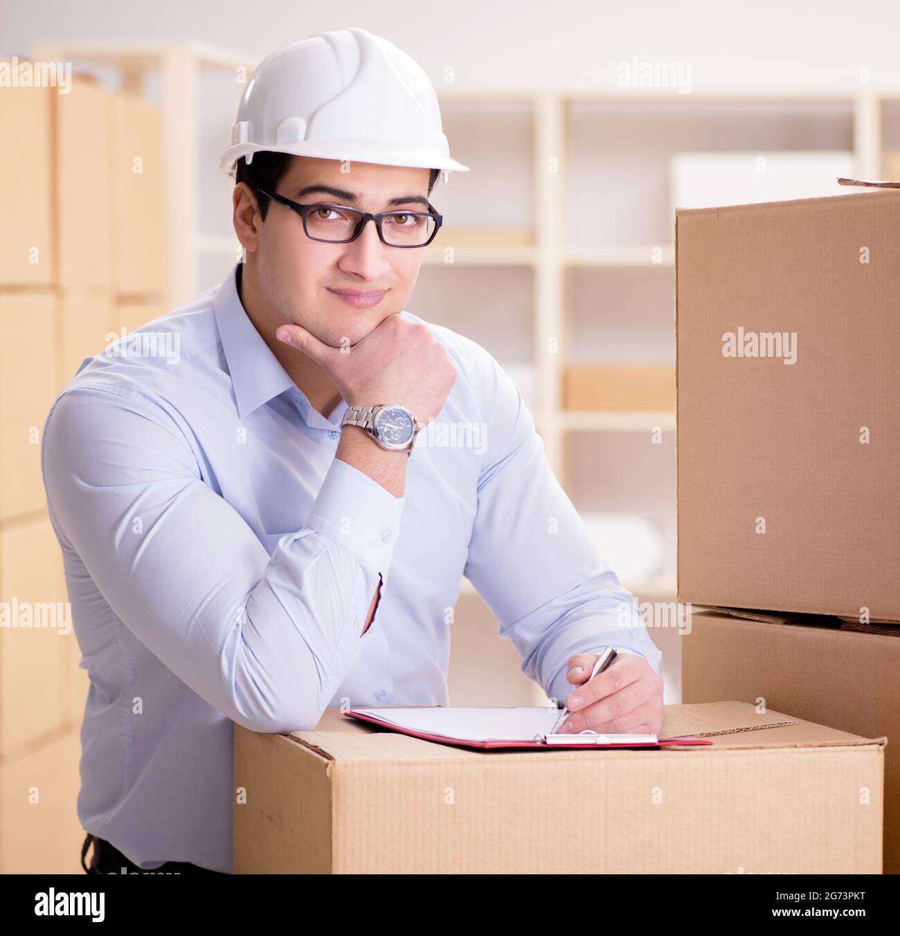 The man working in box delivery relocation service Stock Photo - Alamy