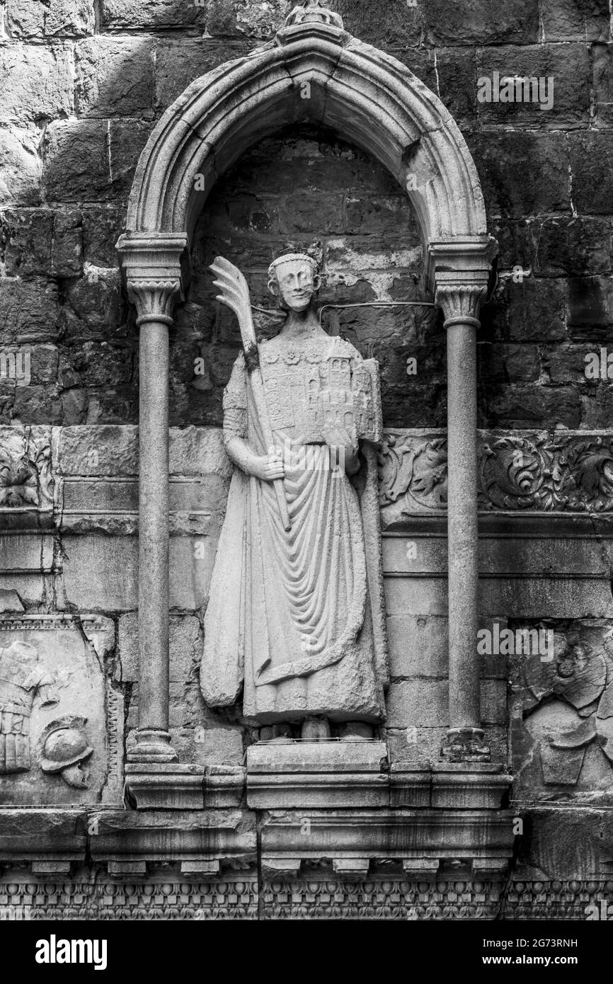 Grayscale of Romanesque-Byzantine statue of San Giusto on the bell ...
