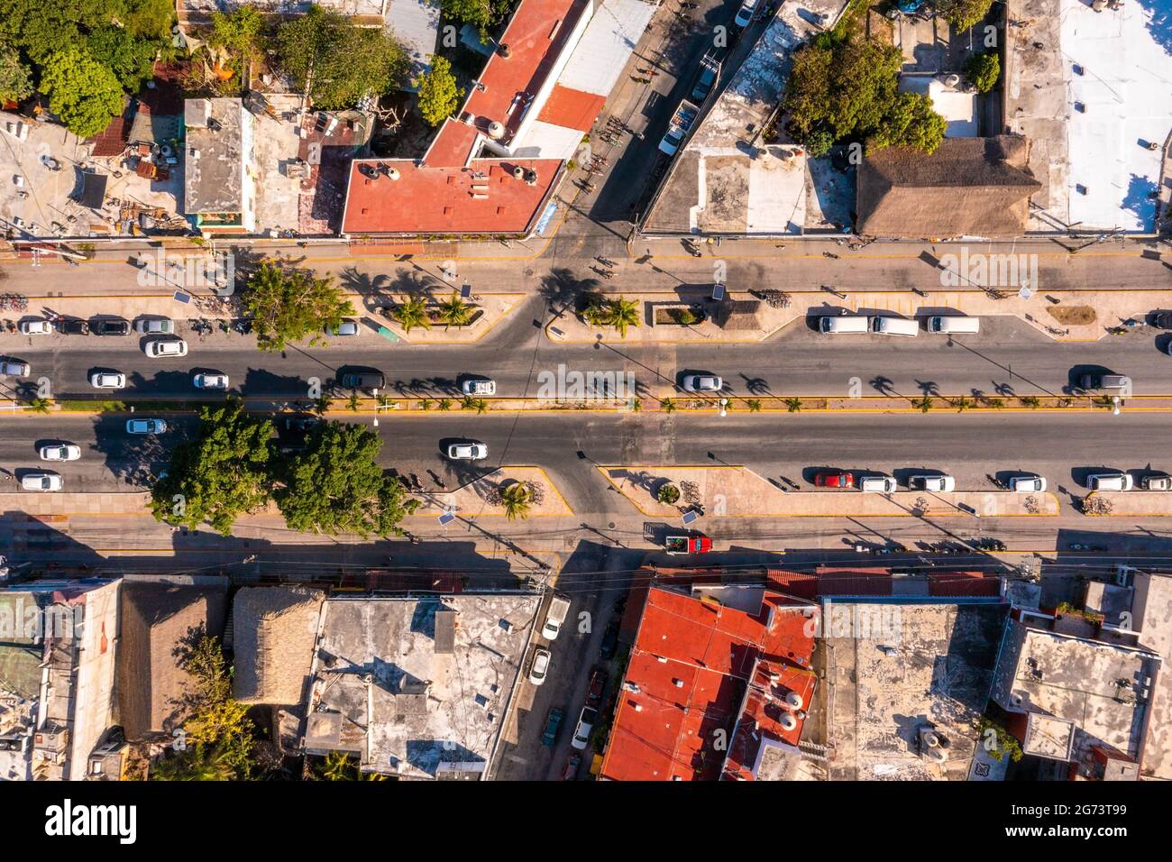 Aerial view of the street intersection with cars driving down the road ...