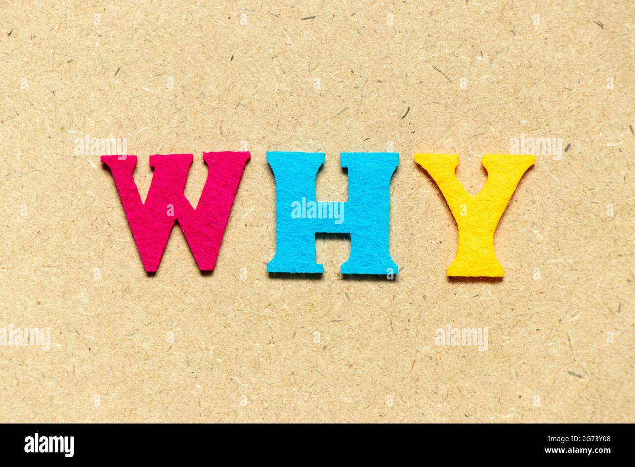 Color cloth alphabet letter in word why on wood background Stock Photo ...