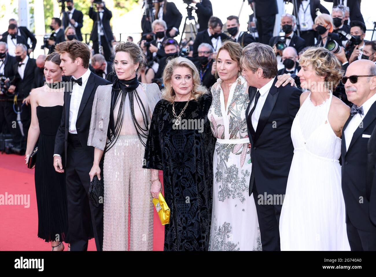 CANNES - JULY 10: Gabriel Sara, Benoit Magimel, Cecile de France ...