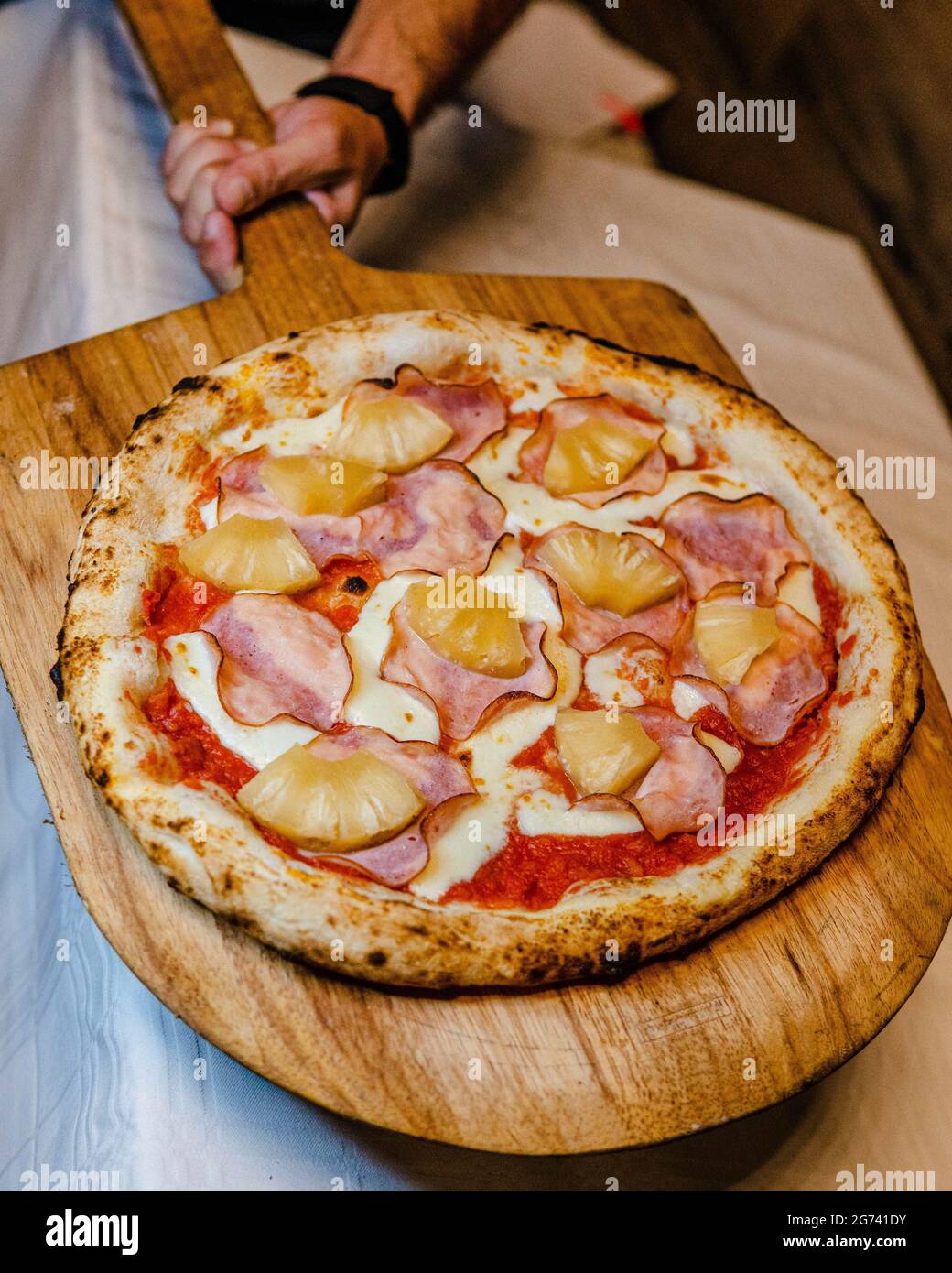 Hawaiian pizza man hi-res stock photography and images - Alamy