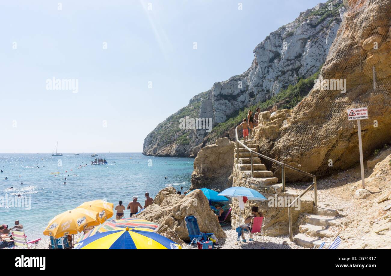 La Granadella Spain - August 20 2016; Busy and over-crowded beach in ...