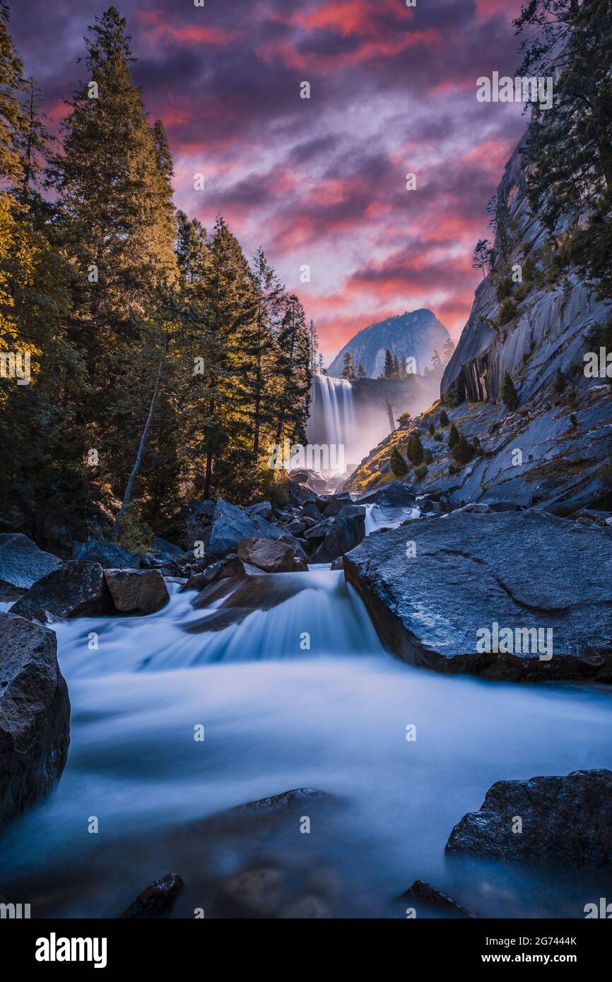 the Vernal Falls waterfall of Yosemite National Park at sunset in ...