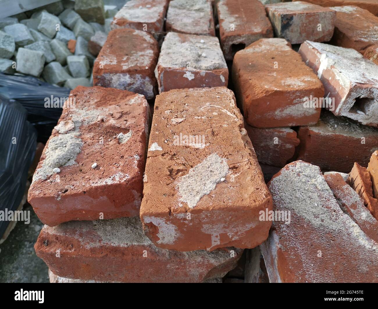 A selective focus shot of weathered red bricks Stock Photo - Alamy
