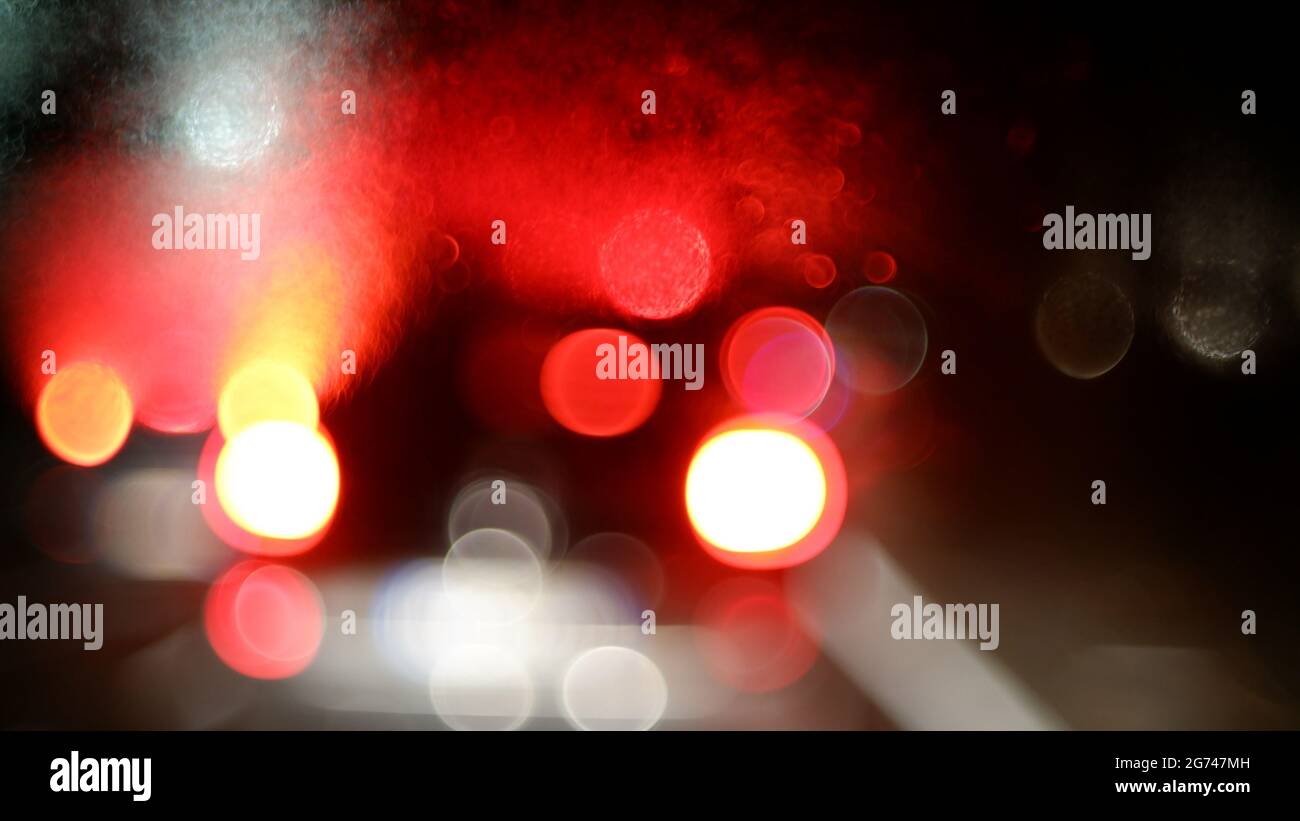 The red bokeh lights of the night city Stock Photo - Alamy
