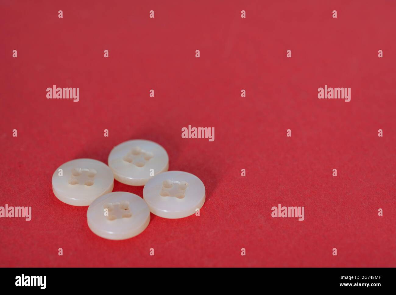 Two shirt buttons hi-res stock photography and images - Alamy