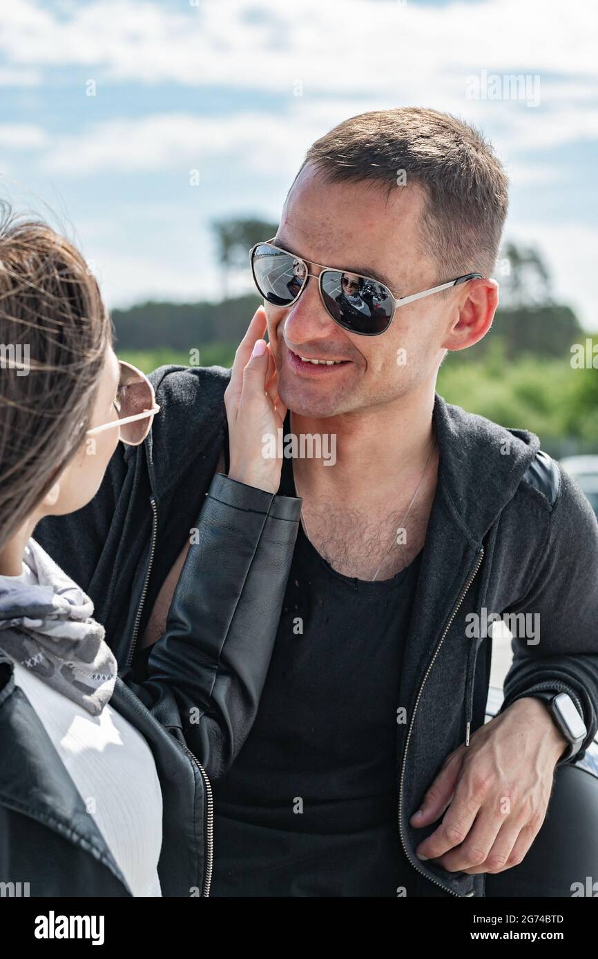 Young pretty attractive caucasian couple in love. Smiling man with ...