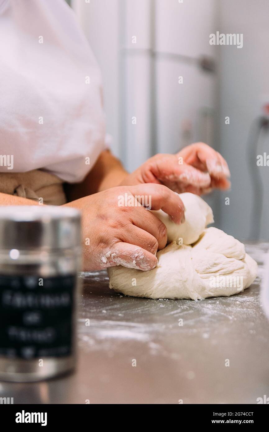 hands working in kitchen bake shop Stock Photo - Alamy