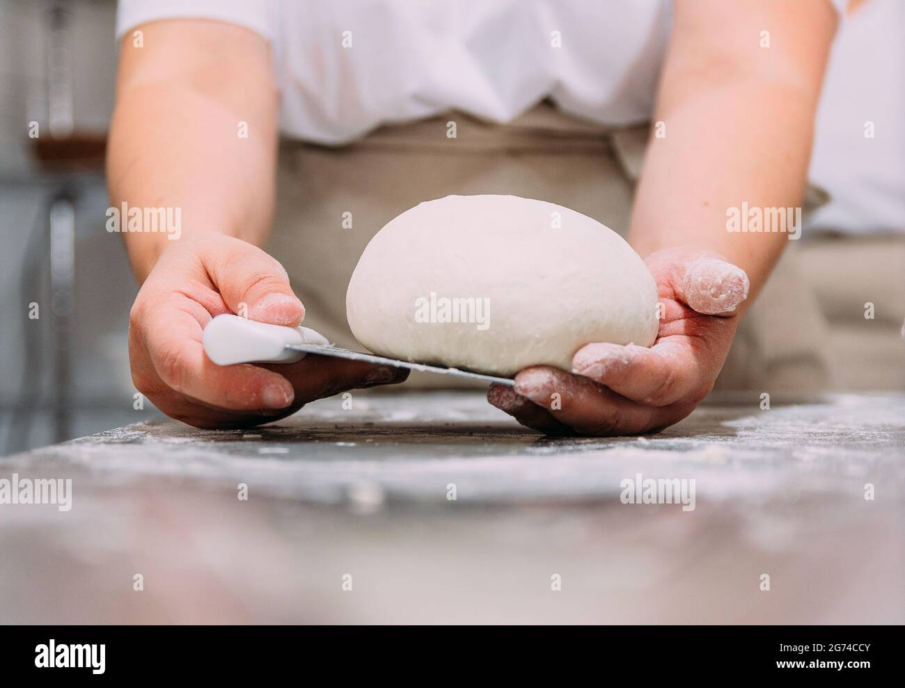 hands working in kitchen bake shop Stock Photo - Alamy