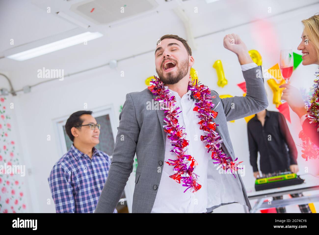 Caucasian Boss dancing in the office party have fun enjoy celebration ...