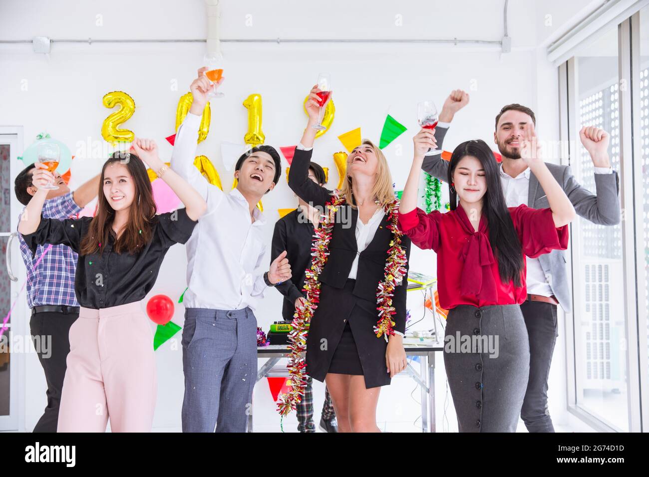 People party in the office. Group of business staff new year holiday ...